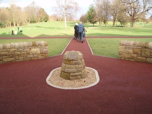 Red surfacing golf walkway - Abacus Playgrounds